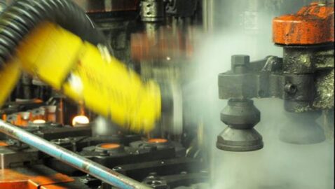 Novaxion swab robot integrated to Bucher Emhart Glass AIS machine at ...